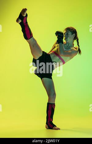 Girl training body combat, isolated on white background Stock Photo - Alamy