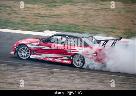 Red Bmw E36 drift at the Navarra circuit Stock Photo - Alamy