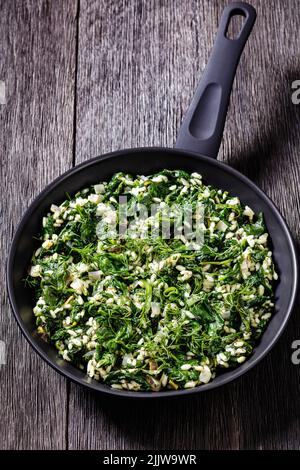 Spanakorizo, Greek spinach and rice pilaf with lemon, dill, spring ...