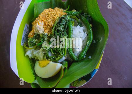 Gudangan, nasi tumpang , traditional salad food from Indonesia. Made of ...