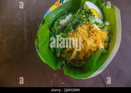 Gudangan, nasi tumpang , traditional salad food from Indonesia. Made of ...