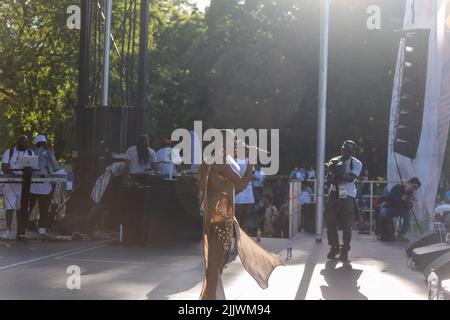A closeup shot of a singer at the 13th Annual Juneteenth celebration in ...