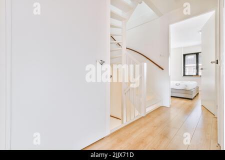 Interior passage way with parquet floor in modern house Stock Photo - Alamy