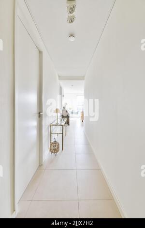 Interior passage way in bright modern house with parquet floor Stock ...