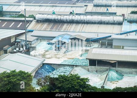 Glass factory. Top view of the piles of crushed glass on the territory ...