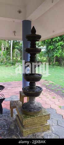 Kalvilakku, A traditional wick stand of Kerala Temple Stock Photo - Alamy