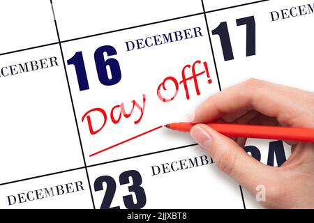 16th day of the month. Hand writing text TODAY on calendar date. Save ...