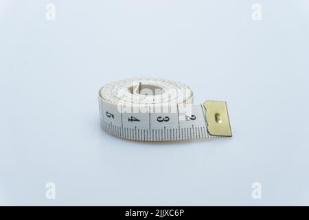 Tape measure to measure various body parts Stock Photo - Alamy