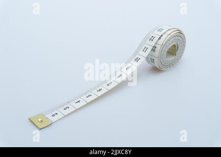 Tape measure to measure various body parts Stock Photo - Alamy