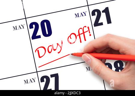 20th day of May. Hand drawing a red circle and writing the text TRAVEL ...