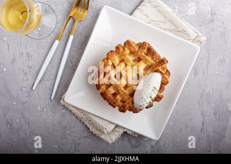Small apple pie with lemon thyme whippe cream, fall dessert Stock Photo ...