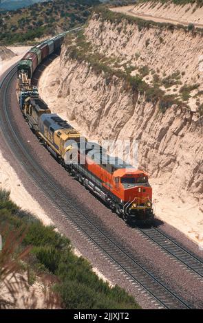 BNSF manifest train pulls through Summit on the Cajon pass Stock Photo - Alamy