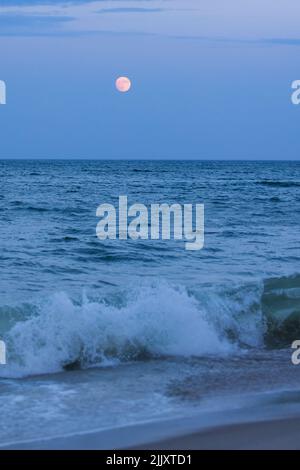 Full moon over Atlantic Ocean in Cape Cod, USA Stock Photo - Alamy