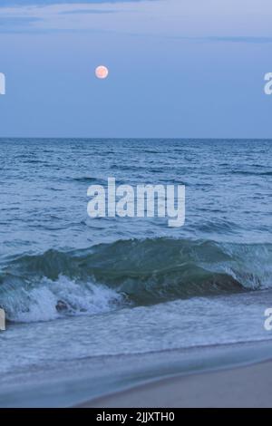 Full moon over Atlantic Ocean in Cape Cod, USA Stock Photo - Alamy