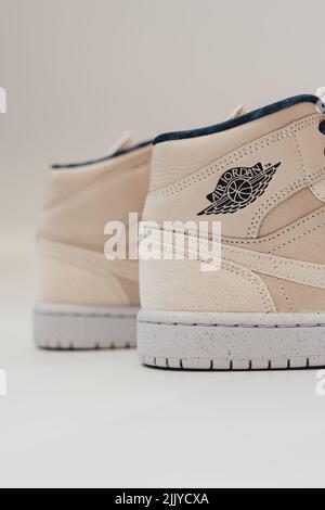 A vertical shot of a bright Nike Air Jordan 1 High OG sneaker Stock ...