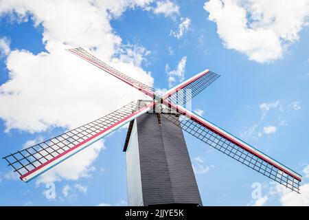 Rustic wooden windmills in idyllic Bruges public park, Belgium Stock ...