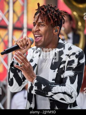 American singer Jon Batiste performs during the opening concert of the ...