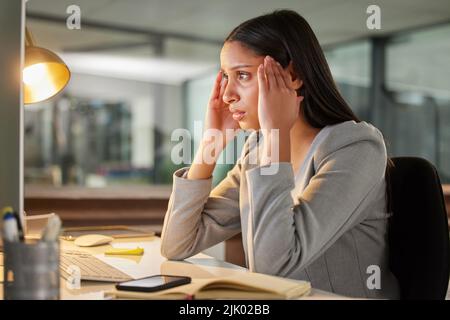 Young depressed businesswoman in dark office Stock Photo - Alamy