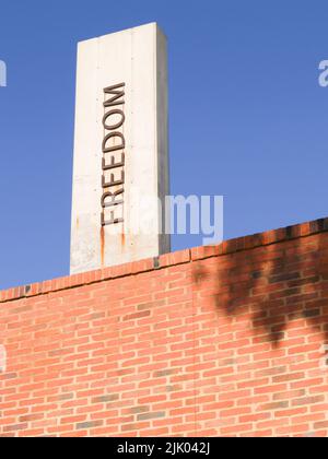 Word responsibility text vertically aligned on sign against blue sky ...