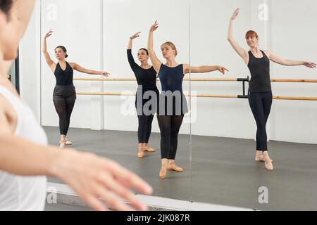 Repeating after instructor Stock Photo - Alamy