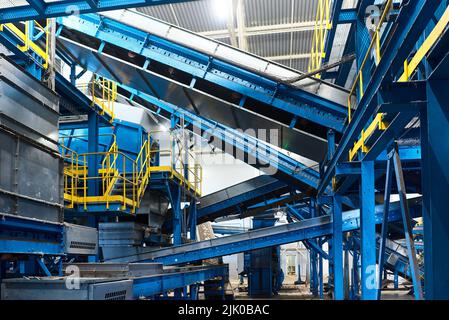 System of conveyors carrying trash at waste processing plant Stock ...