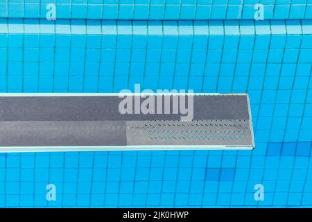 Swimming Pool Diving Board Diver's view over blue water Stock Photo - Alamy