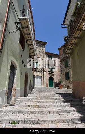A narrow street in Trivento, a mountain village in the Molise region of ...