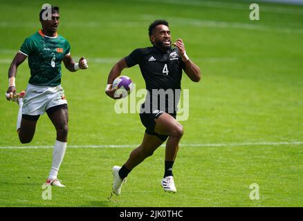 New Zealand's Akuila Rokolisoa breaks free to score a try during the ...