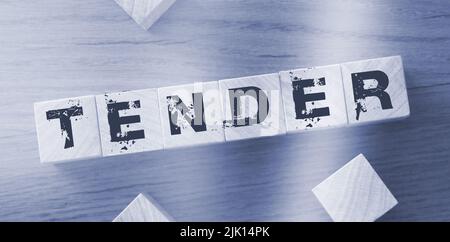 Tender Word Written In Wooden Cubes. Business concept Stock Photo - Alamy