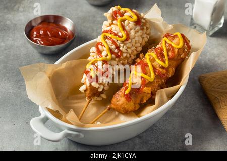 Homemade Fried Korean Corn Dog with Potatoes and Rice Toppings Stock ...