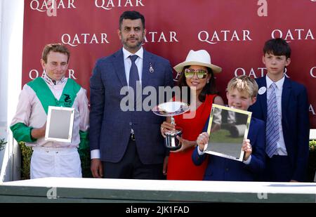 Owner Fitri Hay (left) and jockey Jamie Spencer (right) pick up their ...