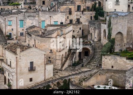 Residential cave houses in historic downtown Matera, Italy Stock Photo ...