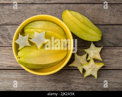 Plate of Juicy Fresh Ripe Starfruit's Cross Sections with Whole Fruit ...