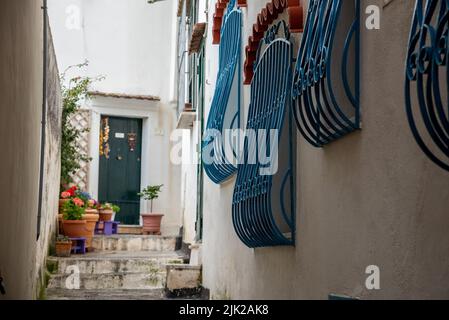 Alleyway and scenic window grilles in Amalfi, Southern Italy Stock ...