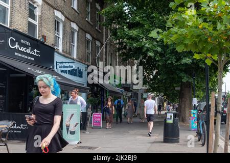 London- July 2022: Chiswick High Road summer scene, a long street of ...