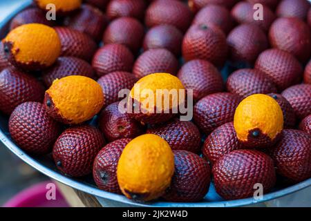 Aguaje (Mauritia flexuosa) on sale at Belen Market in Iquitos, Peru is ...