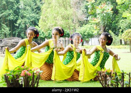Indonesian traditional dancers with traditional clothes which are ...