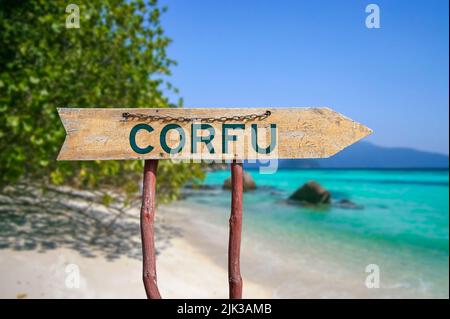 Corfu wooden sign with beach background Stock Photo - Alamy