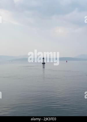 single lighthouse mindfulness empty background with ocean and blank sky ...