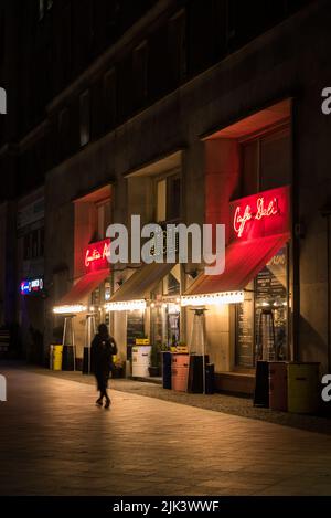 The neon lights of Warsaw central Stock Photo - Alamy