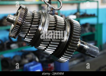 Industrial vertical gearbox. Large gears of a truck. Engine and gear ...