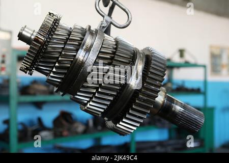 Industrial vertical gearbox. Large gears of a truck. Engine and gear ...