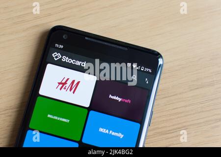 Stocard app on mobile device holding multiple store loyalty card Stock ...