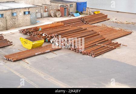 Shipment of imported steel bars in a dockyard Stock Photo - Alamy