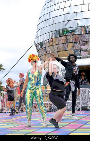 Members of dance troupe Diverse City perform on a makeshift stage as ...