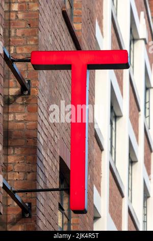 red single capital letter T sign on building in Liverpool Stock Photo ...