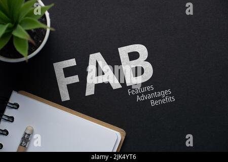 Concept business marketing acronym FAB or Features, Advantages ...