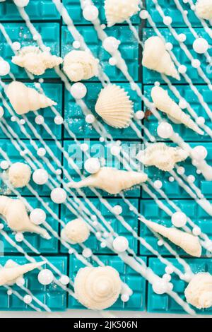 Mini mermaid chocolate bars drizzled with white chocolate, sprinkling ...