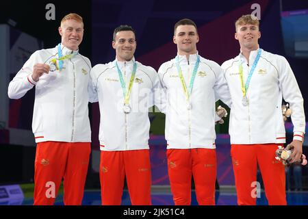 England's James Guy, Jacob Whittle, Tom Dean, and Lewis Burras after ...
