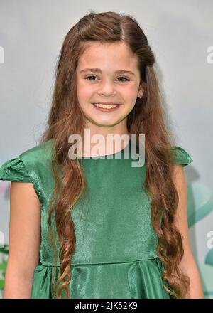 Adelynn Spoon walking on the red carpet at the global premiere of the ...